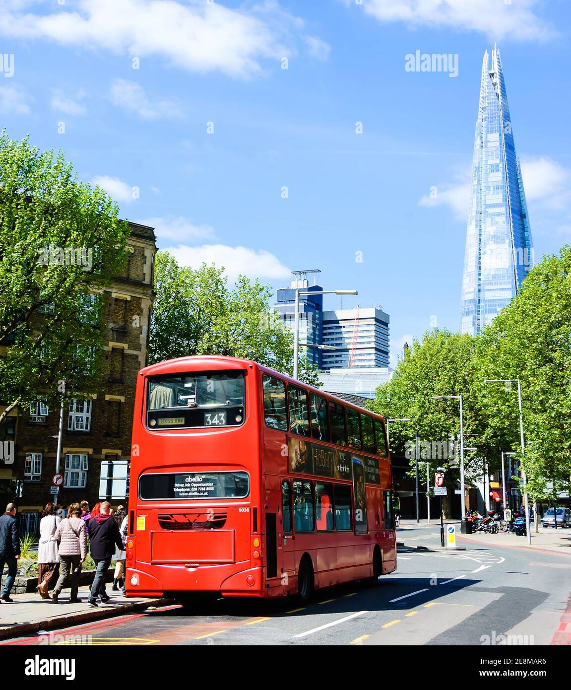 LONDON, ENGLAND, UK - MAY 3, 2014: Double decker red bus and The Shard ...