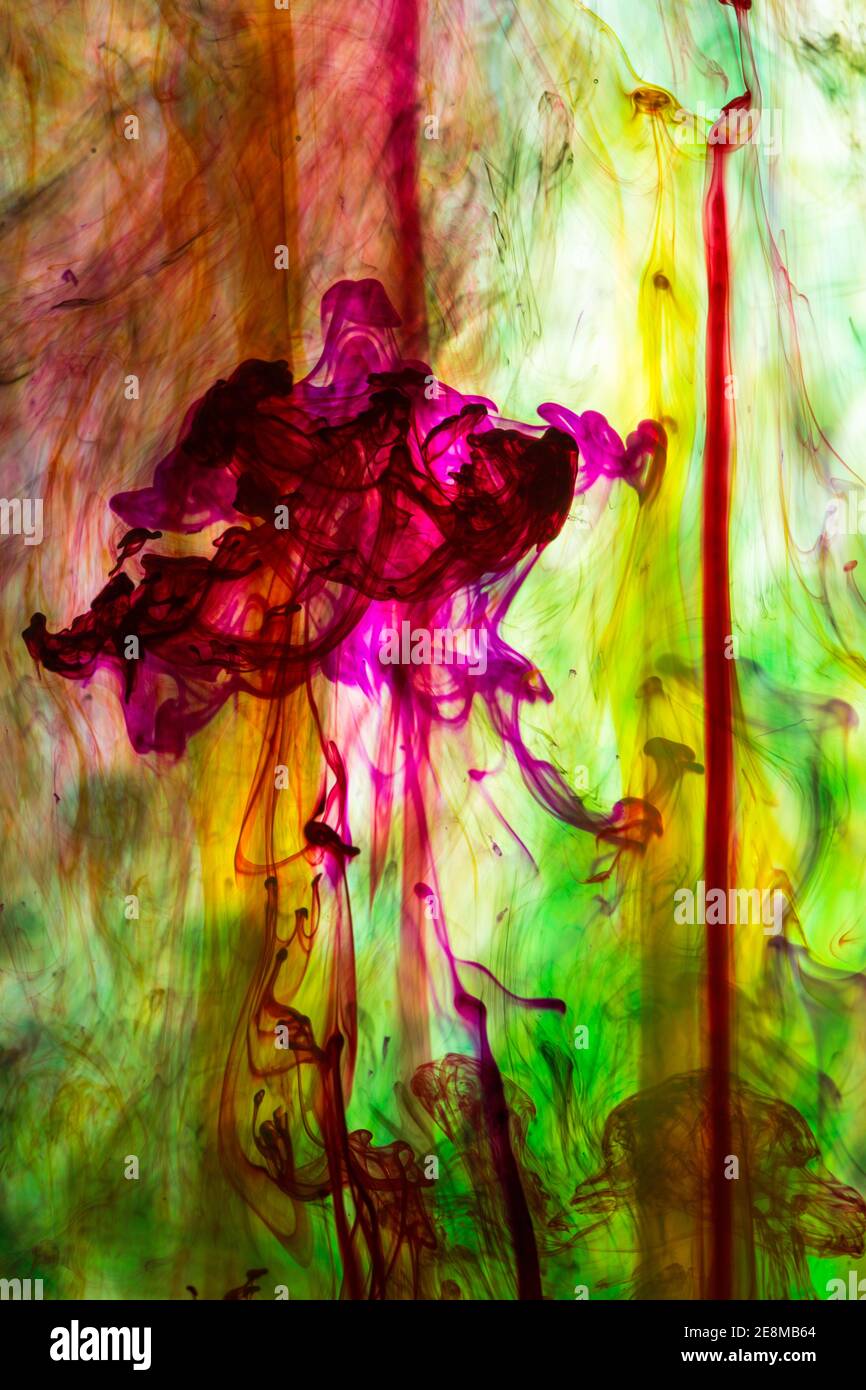 Acrylic colors and ink in water. Abstract background Stock Photo - Alamy