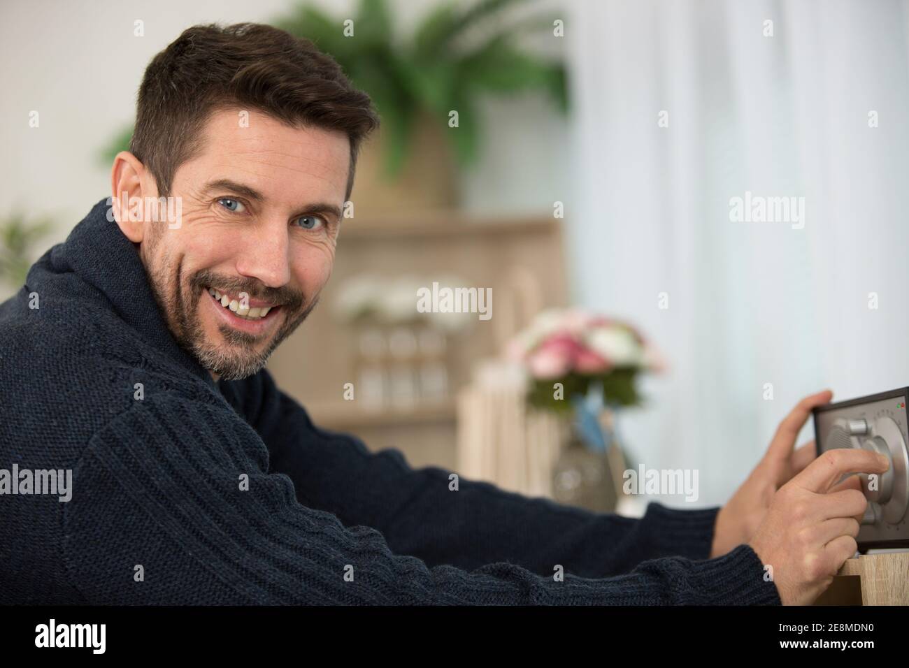 Adjusting settings on camera hi-res stock photography and images - Alamy