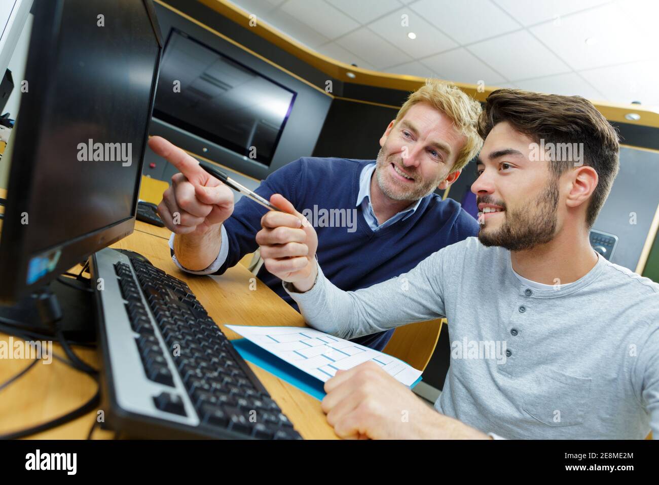 Teacher positive support high five hi-res stock photography and images ...