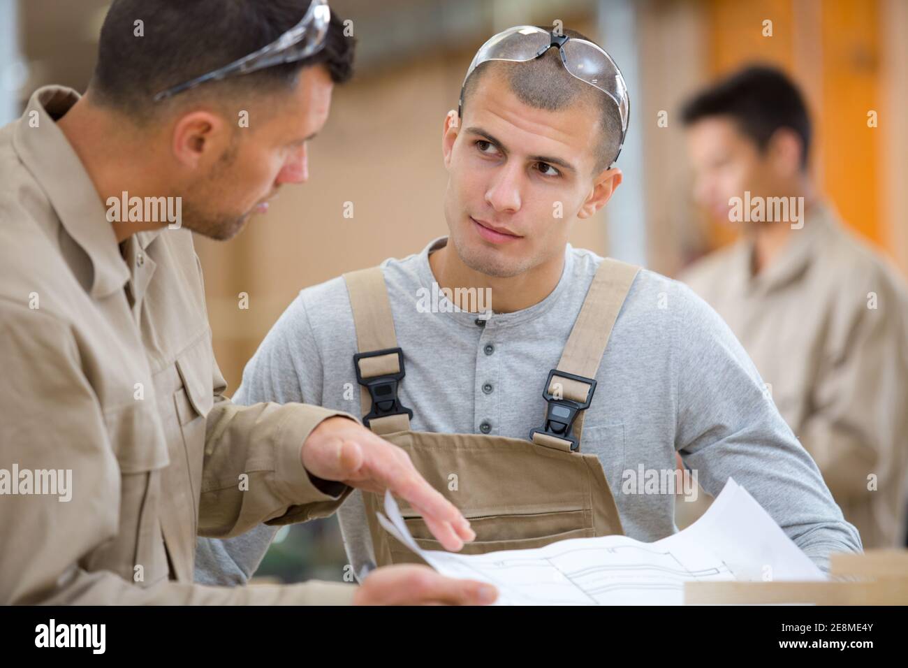 Paper production workers hi-res stock photography and images - Alamy