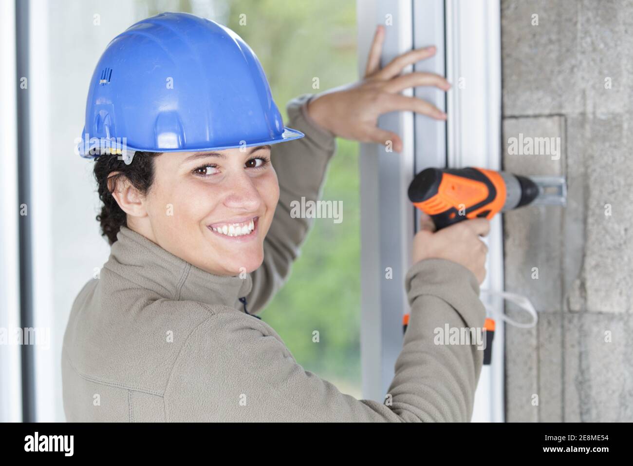 Female carpenter hand drill hi-res stock photography and images - Alamy