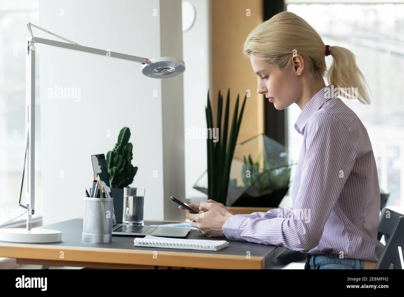 Female employee hi-res stock photography and images - Alamy