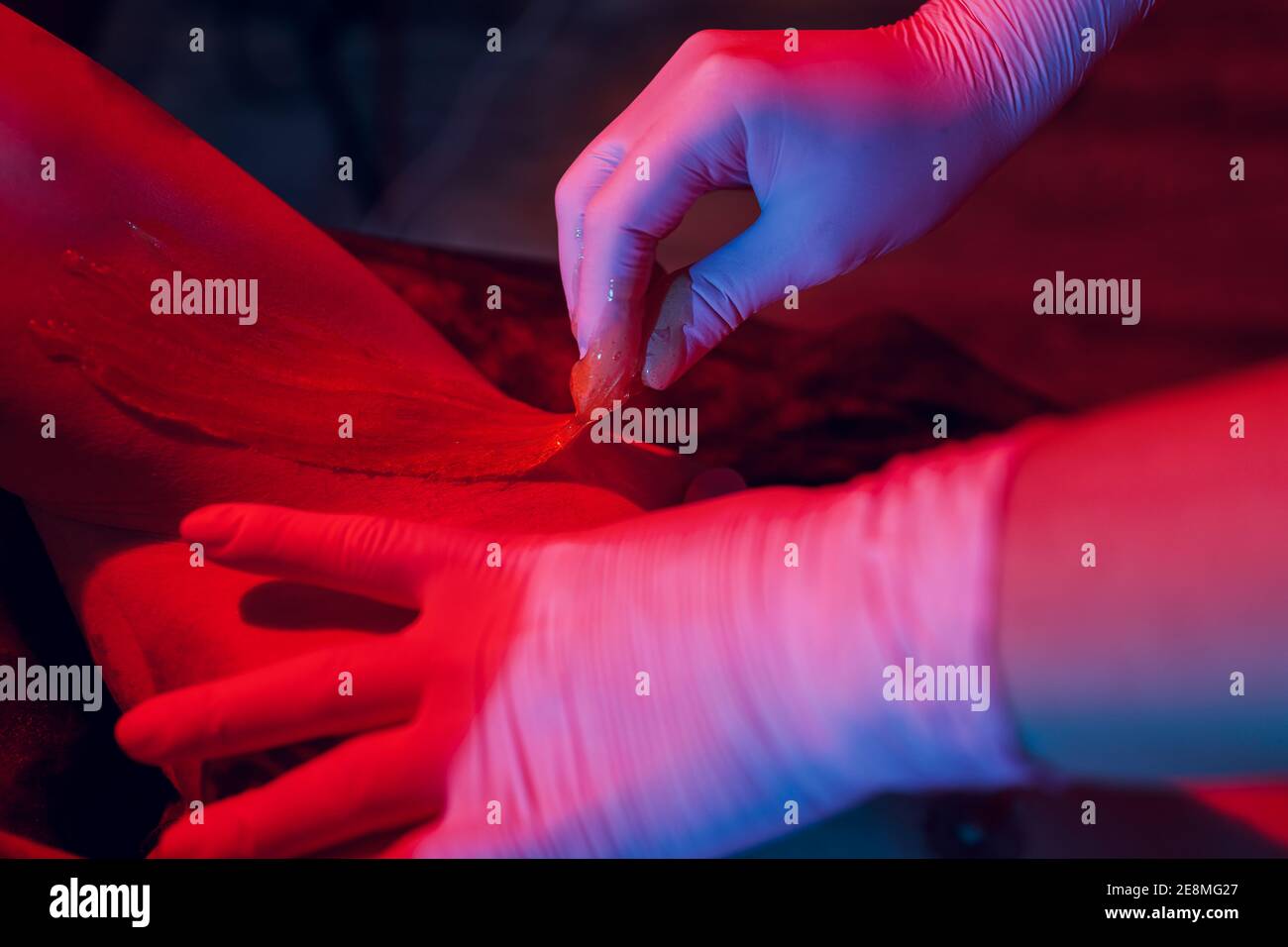 men sugaring hair removal armpit salon male Stock Photo - Alamy