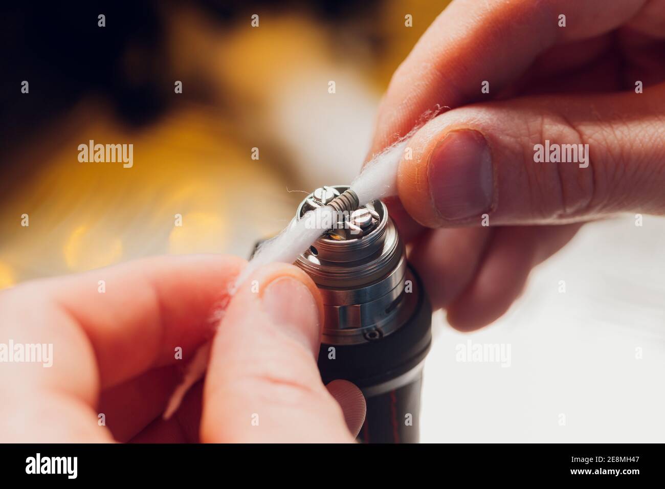 Specialist replaces spring for smoking vape.Professional maintaining ...