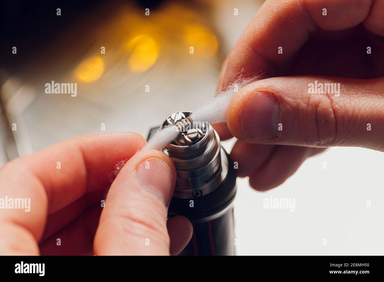 Specialist replaces spring for smoking vape.Professional maintaining ...