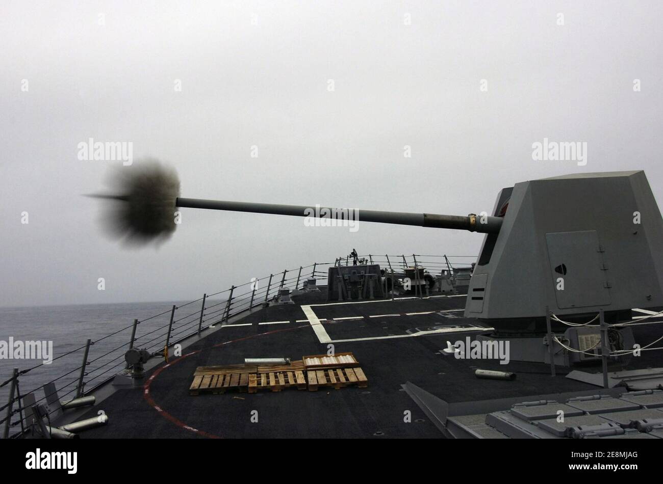 Mk 45 gun of USS Preble (DDG-88) firing during pre-aim calibration fire ...
