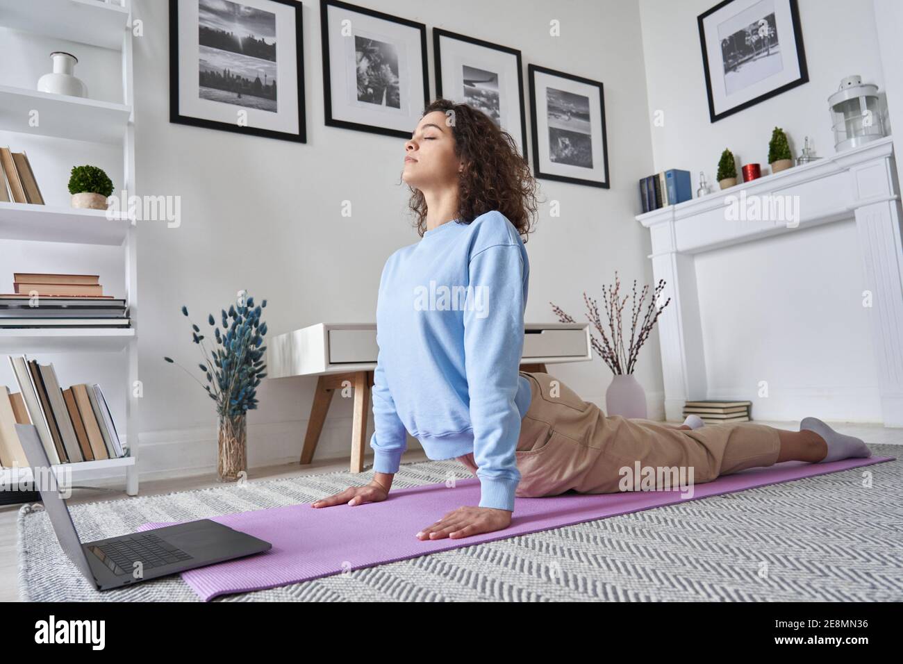 Girl stretching laptop hi-res stock photography and images - Alamy