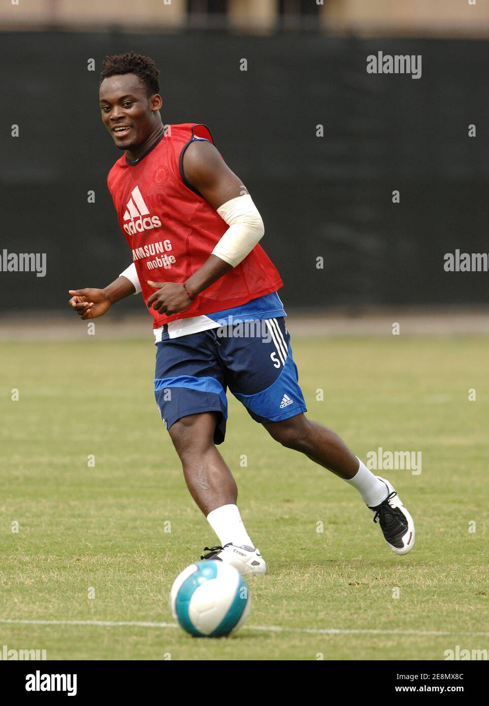 Michael Essien in action during Chelsea Football Club first training ...
