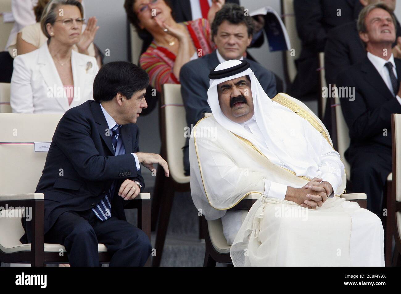 Prime minister Francois Fillon and Qatar's emir Sheikh Hamad bin ...