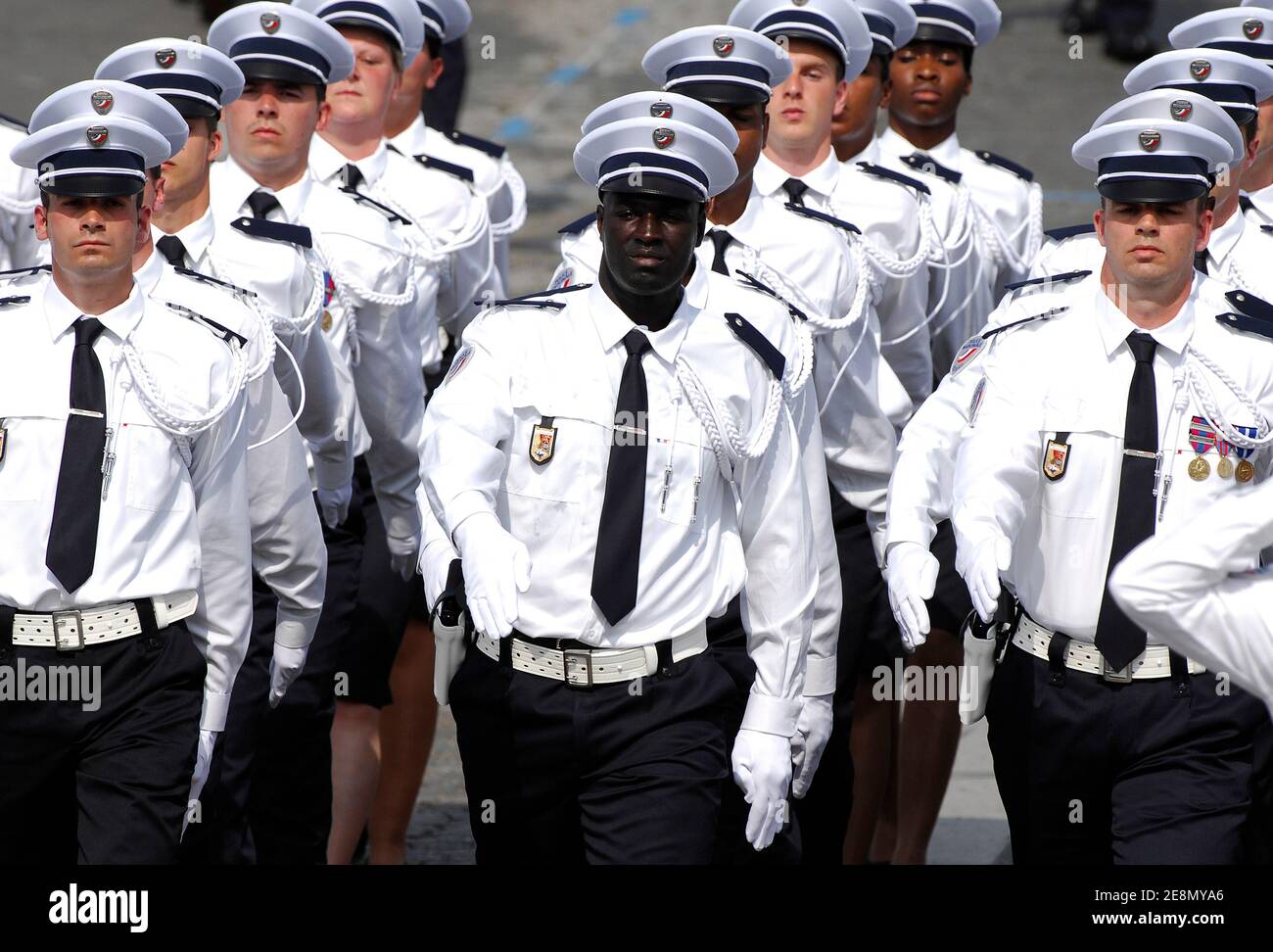 French 'Police Nationale' troop parades on the Champs-Elysees in Paris ...