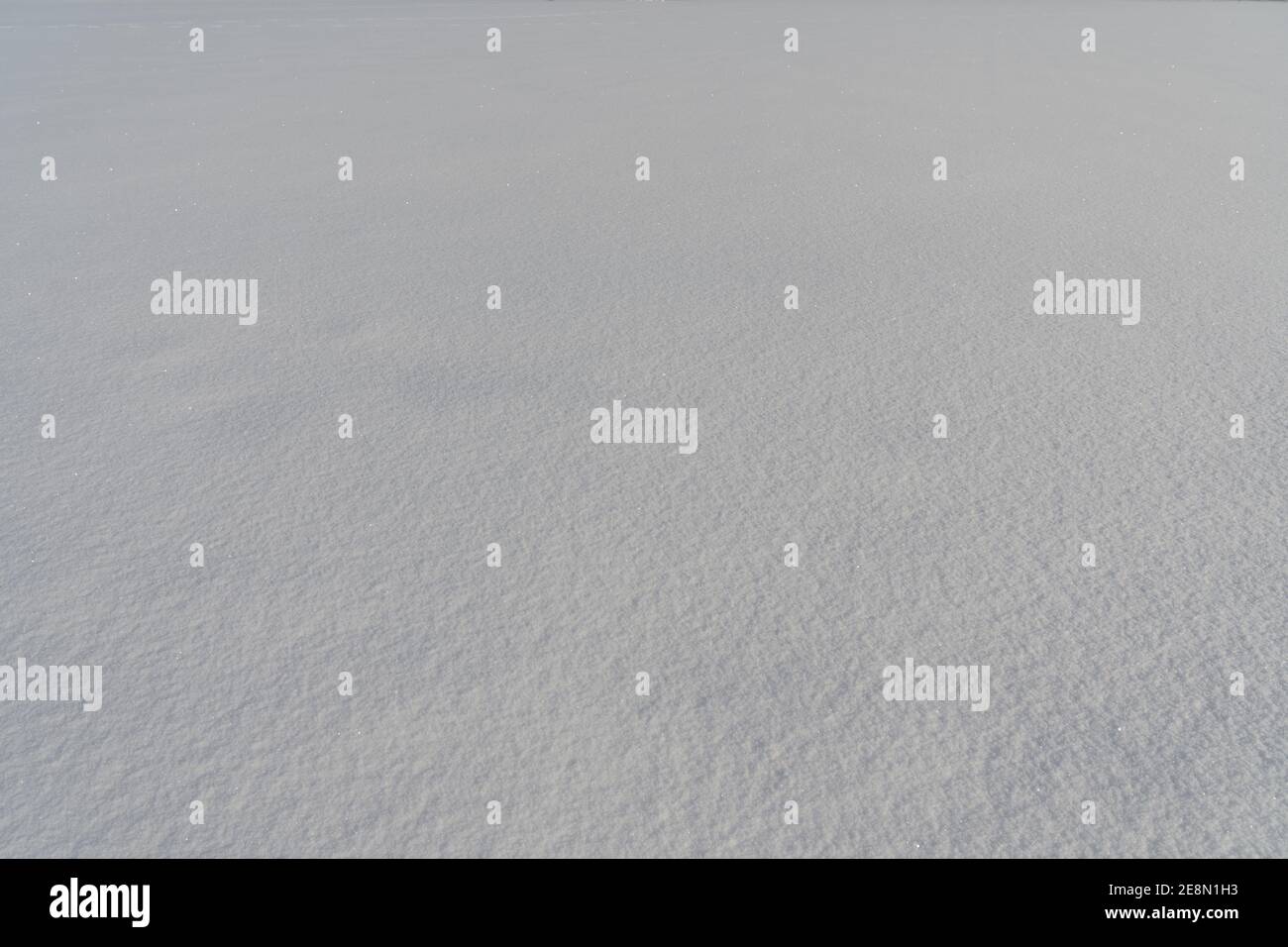 A clear patch of fresh, frozen and perfectly smooth snow Stock Photo ...