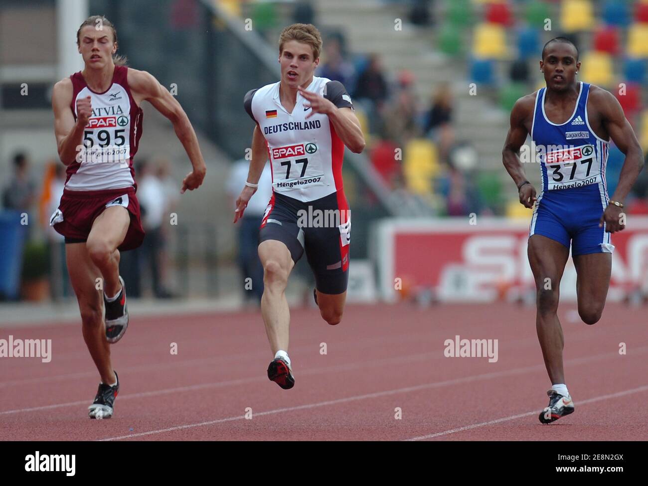 Germany's Julian Reus wins the gold medal and France's Yannick Lesourd ...