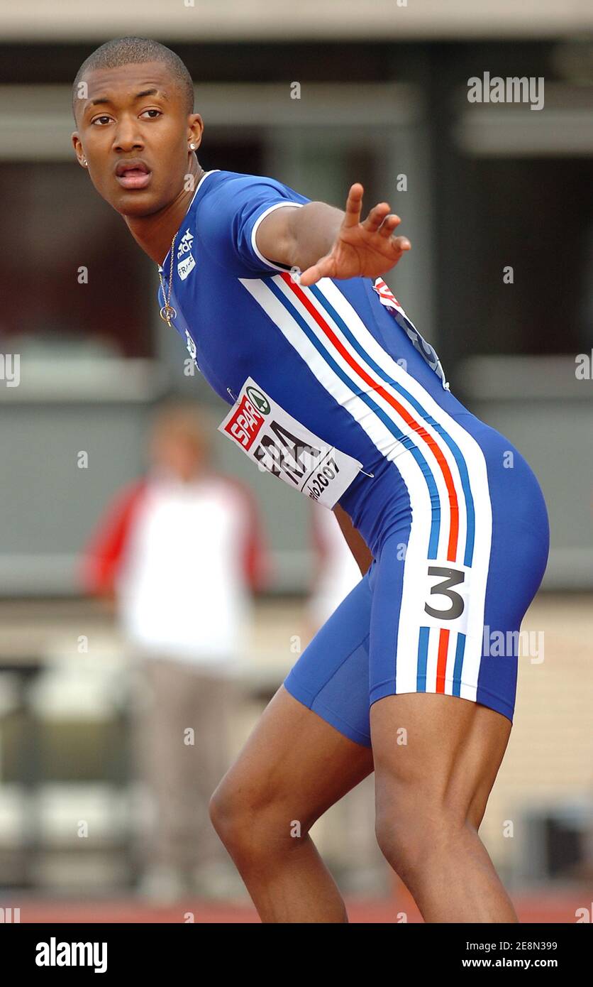 France's Bruno Naprix competes on men's 4x400 meters relay during the ...