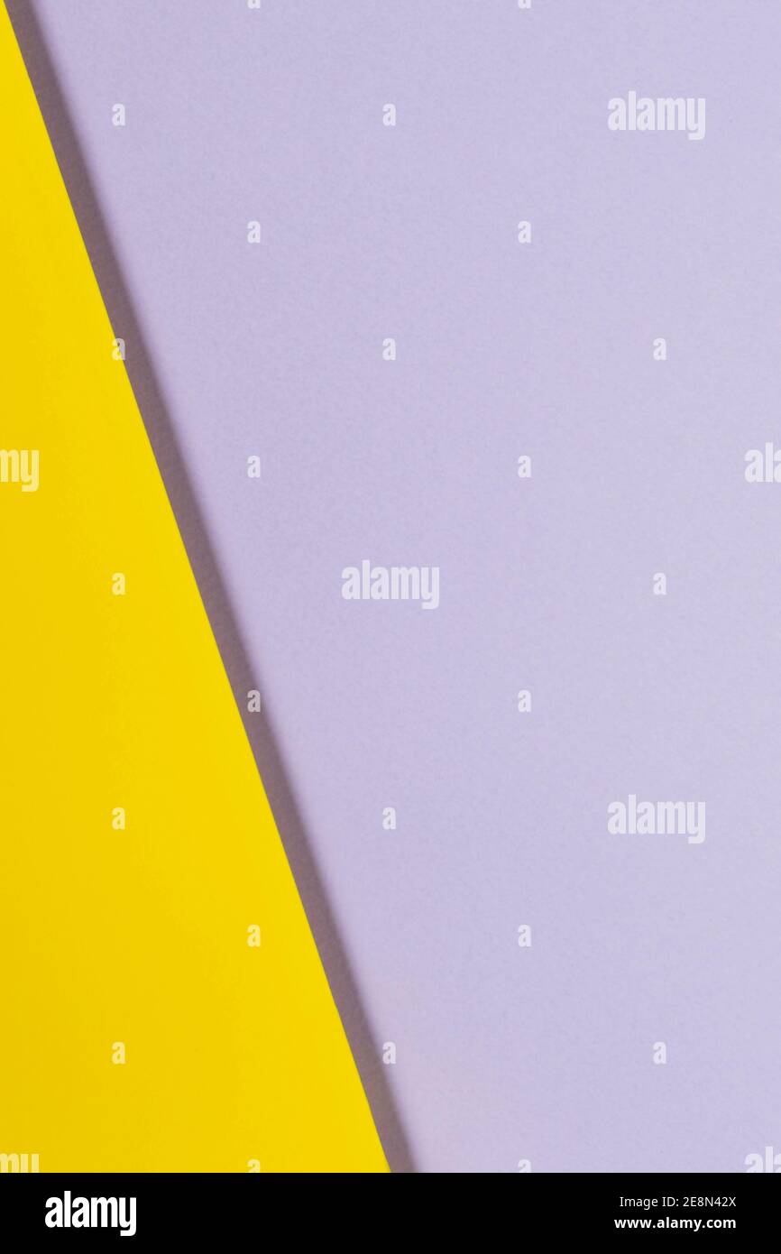 Abstract geometric paper background in yellow and gray colors. Top view ...