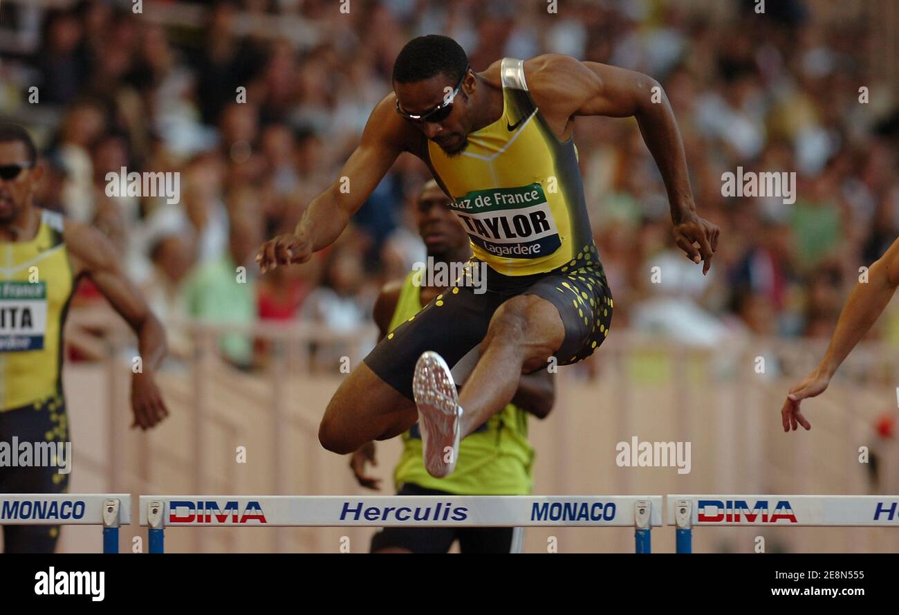 USA's Angelo Taylor competes on men's 400 meters hurdles during the ...