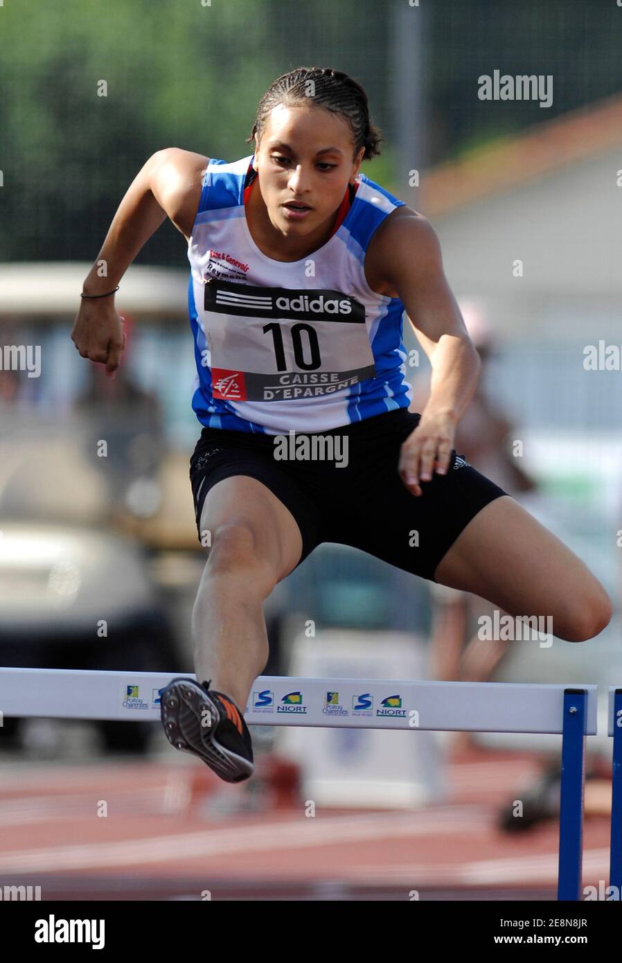 France's Dora Jemaa competes on women's 400 meters hurdles heats during ...
