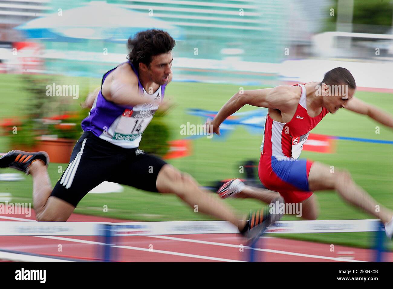 France's Sebastien Maillard competes on the men's 400 meters hurdles ...