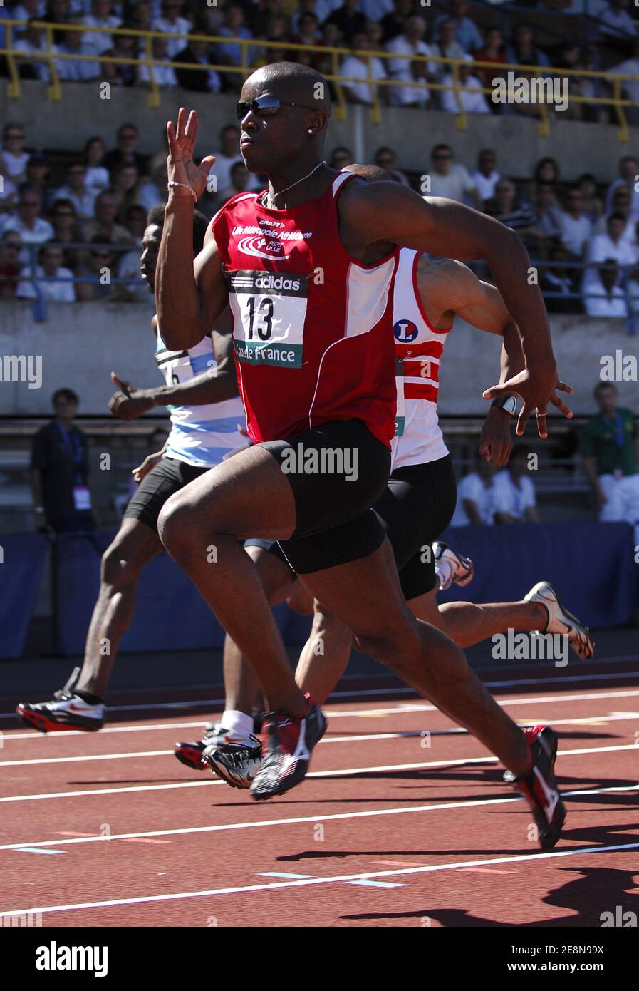 France's Martial Mbandjock competes on men's 100 meters final during ...