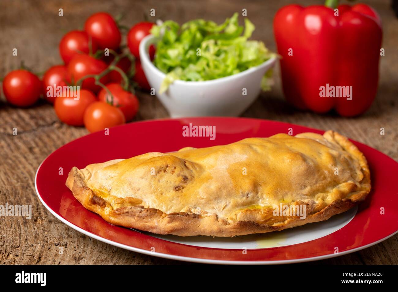 Pizza calzone with chicken and pepper hi-res stock photography and ...