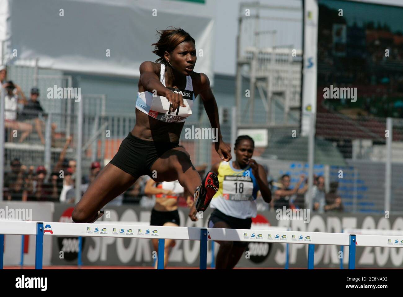 France's Aurore Kassambara competes on women's 400 meters hurdles ...