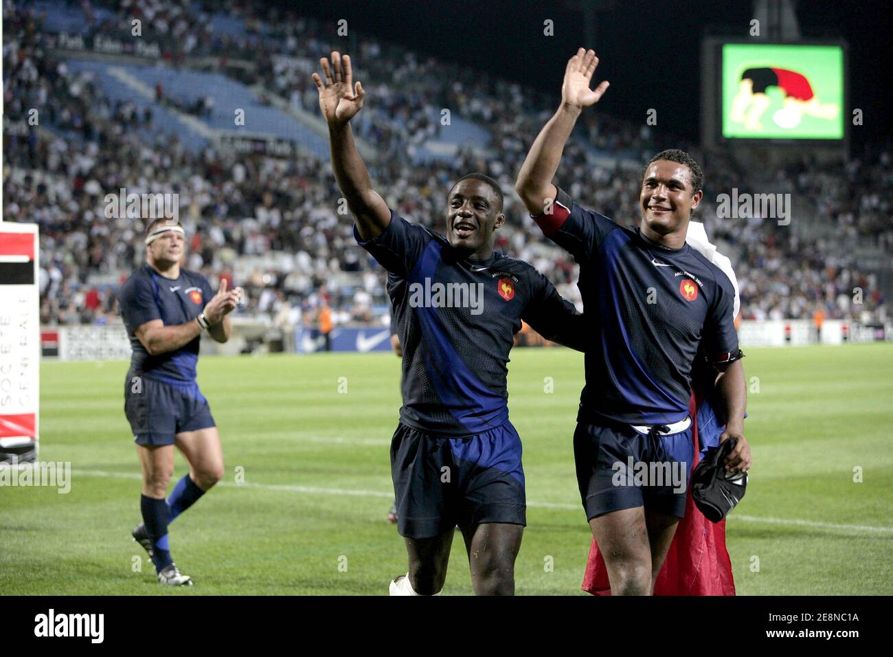 France's Yannick Nyanga and Thierry Dusautoir celebrate victory during ...
