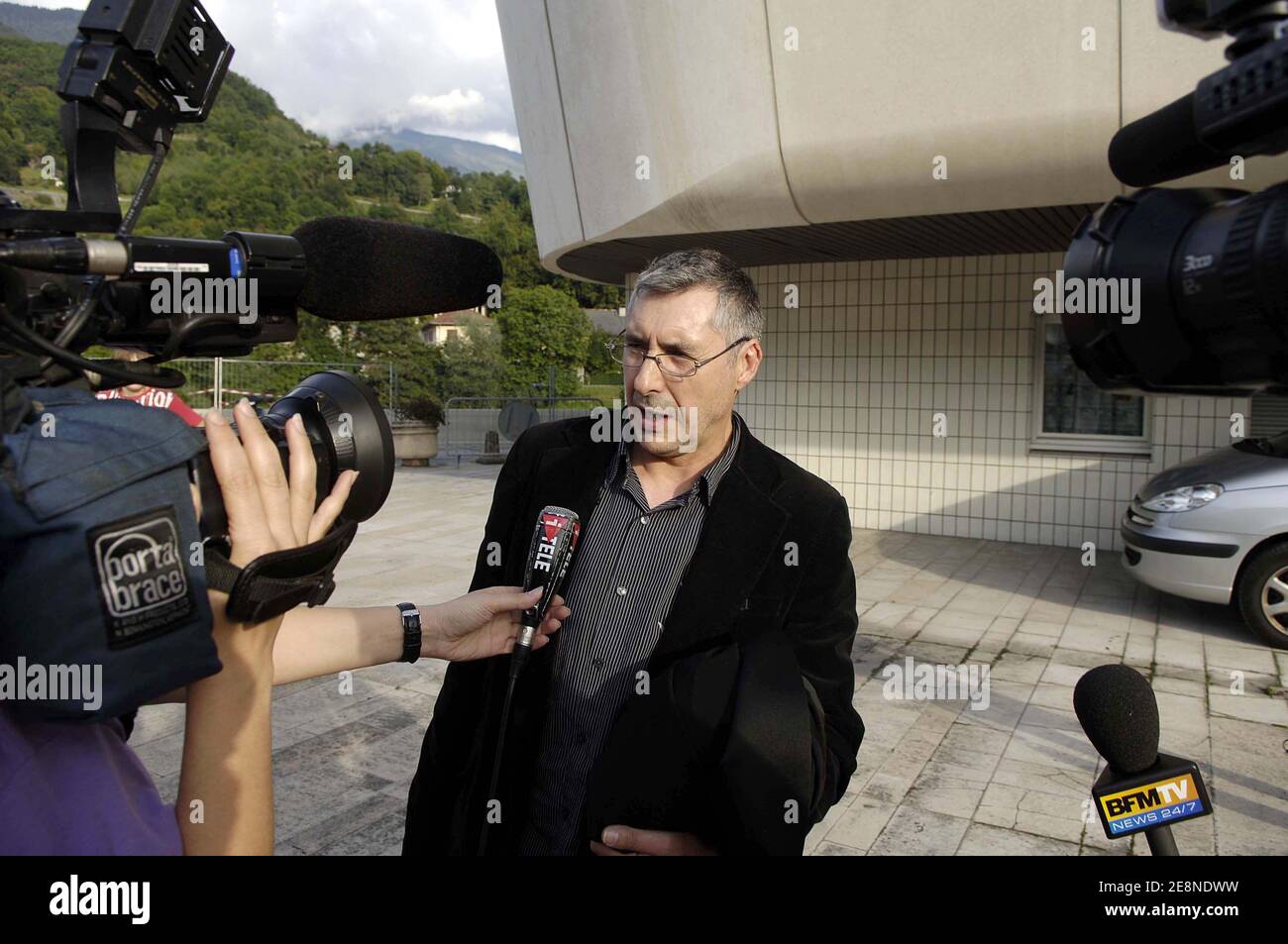 Virginie Labrosse's lawyer Michel Jugnet speaks with journalists front ...