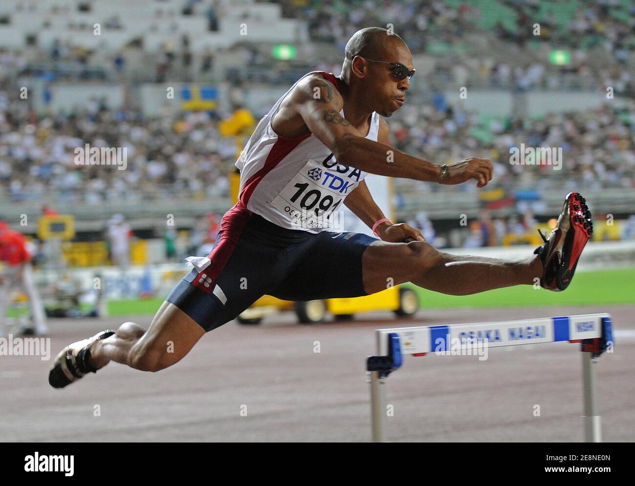 USA' James Carter competes on men's 400 meters hurdles heats during the ...