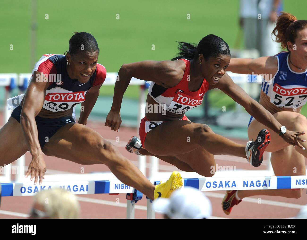Canada's Perdita Felicien and US' Virginia Powell compete on women's ...