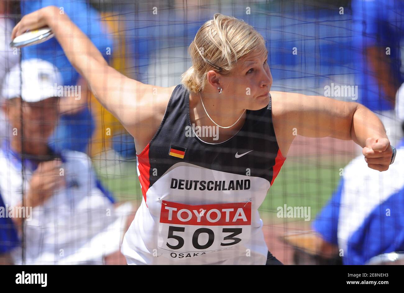 Germany's Nadine Muller competes on women's discus throw qualification ...