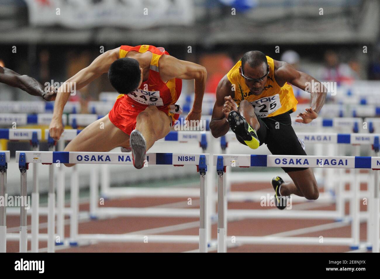 Jamaica's Maurice Wignall and China's Dongpeng Shi competes on men's ...
