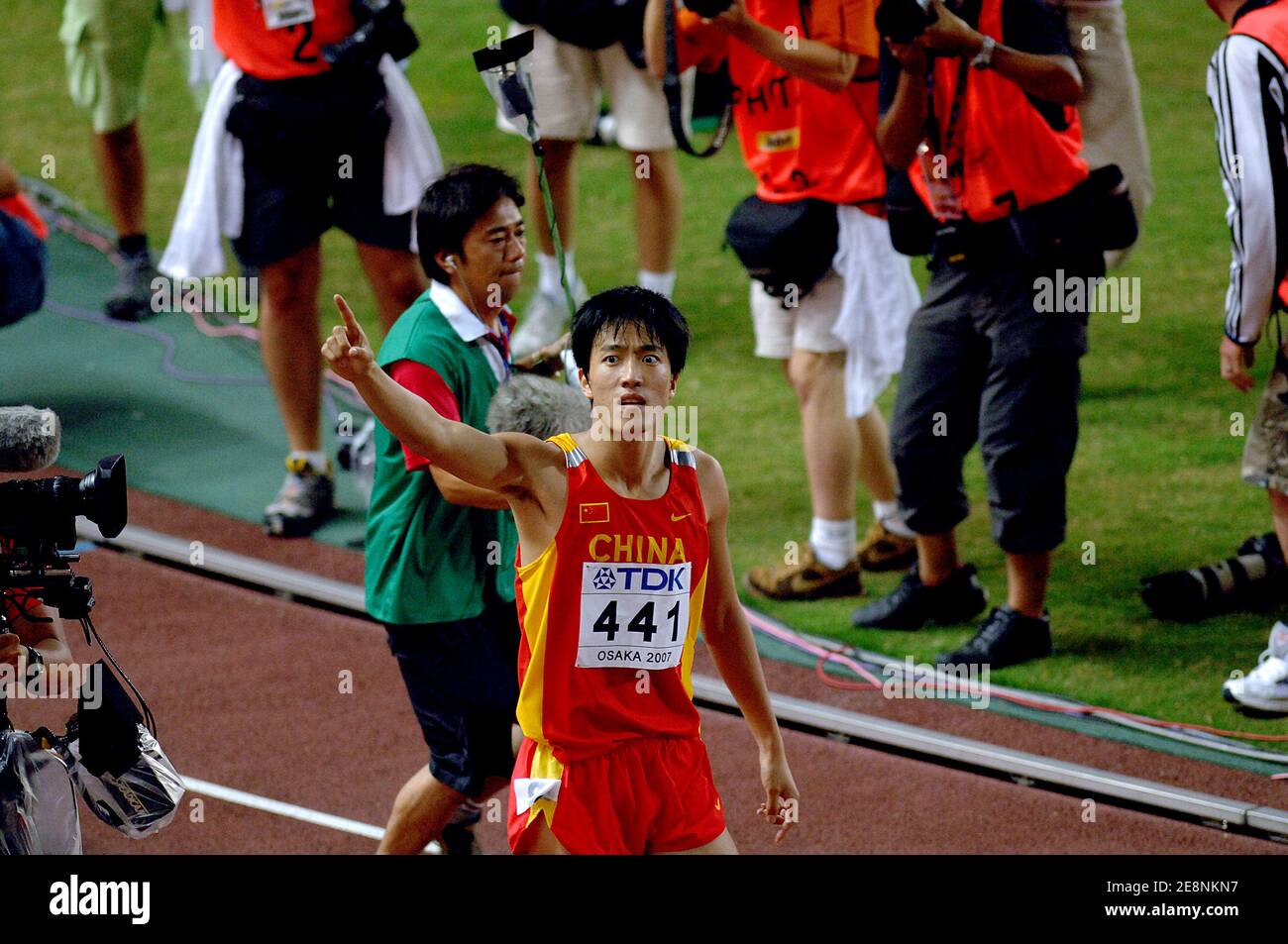 China's Xiang Liu performs on men's 110 meters hurdles final during ...