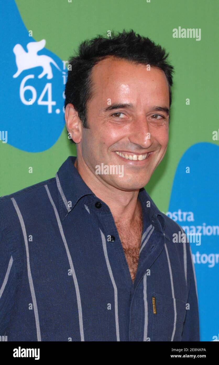 Cast member Bruno Todeschini poses for pictures during the photocall ...