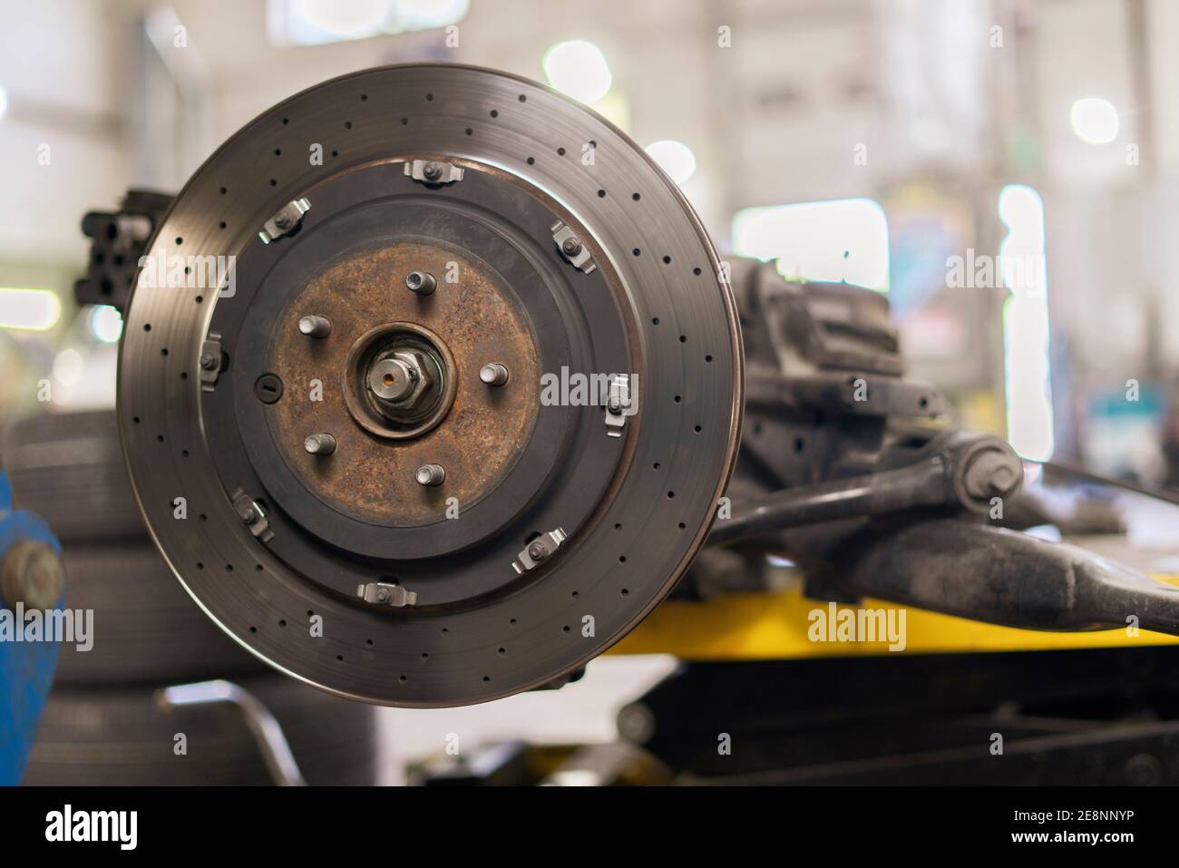 a close up metal chrome brake disk, repair vehicle parts of the sport ...