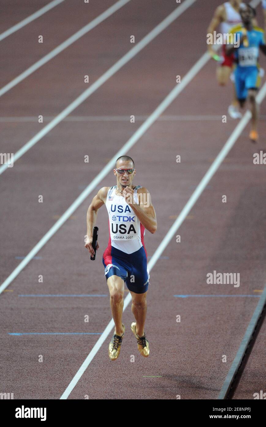 USA's Jeremy Wariner performs on men's 4X400 meters relay final during ...