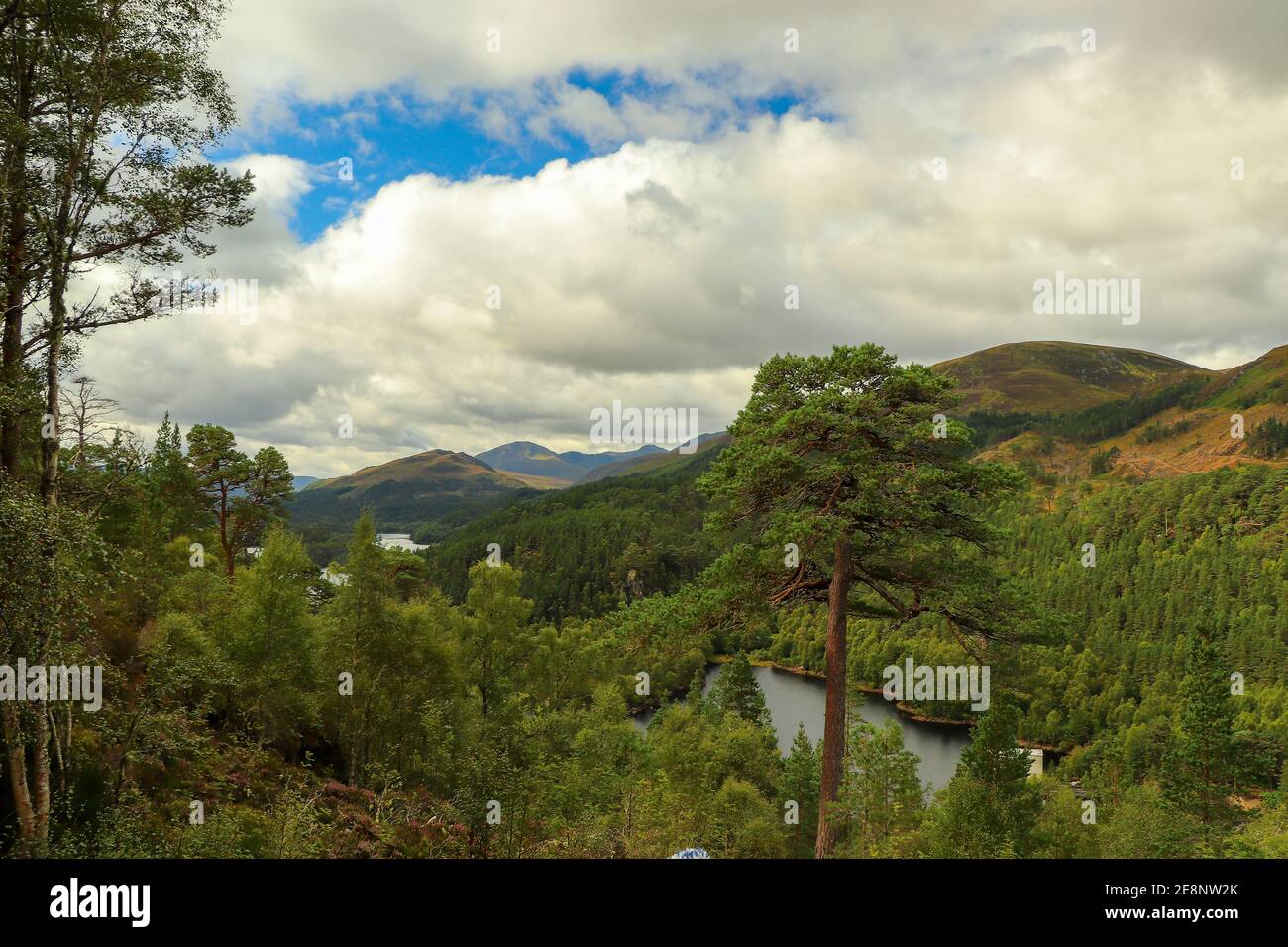 A view down from the hills of Scotland to the glens, rivers and lochs ...
