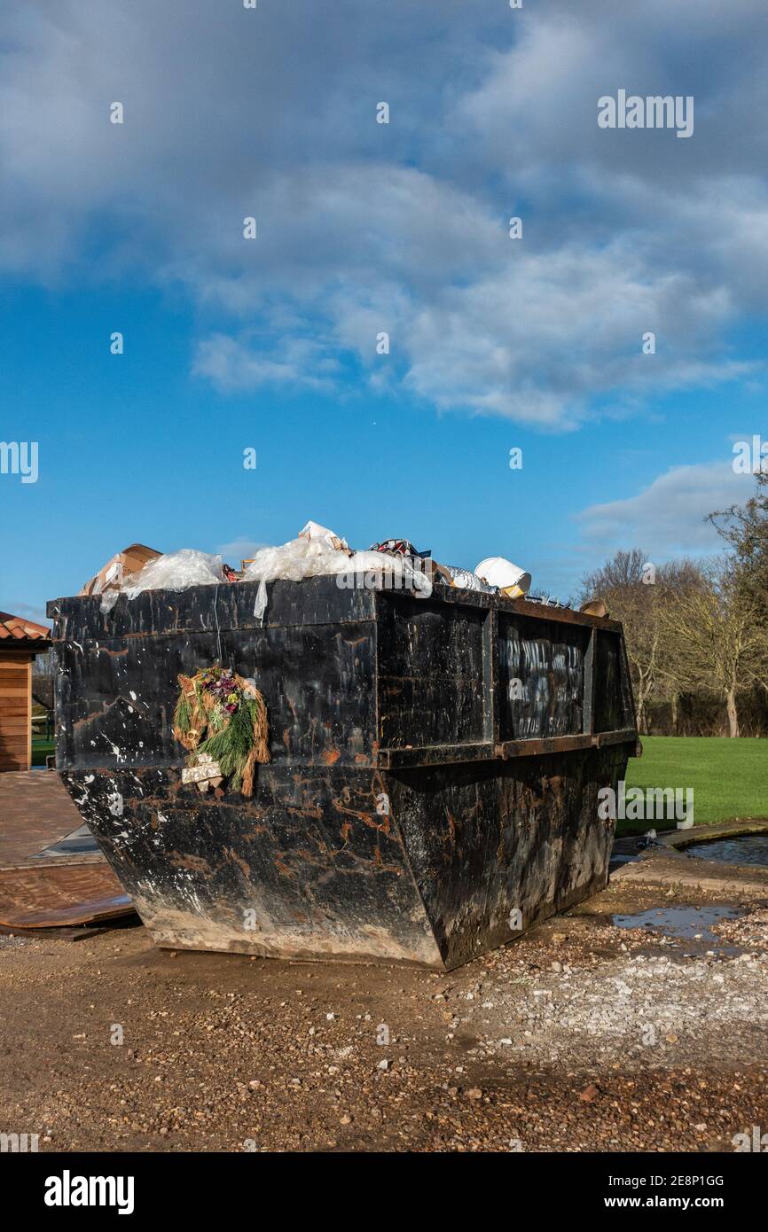 Builders very large skip on a private home building site Stock Photo ...