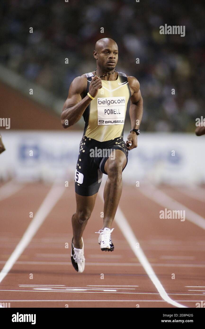 Jamaica's Asafa Powell wins the men's 100 meters event during the IAAF ...