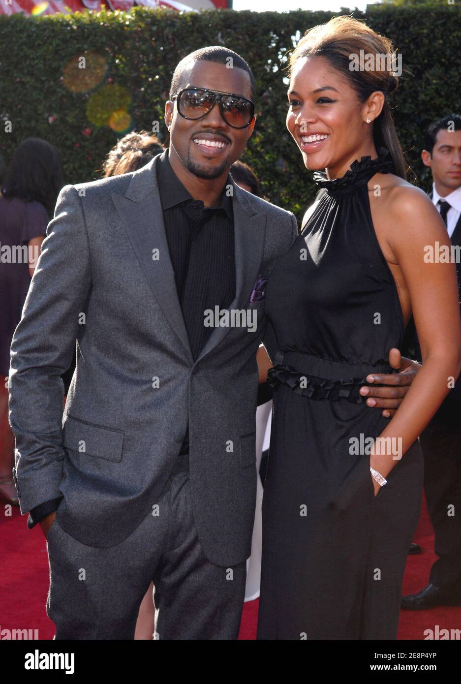 Designer Alexis Phifer and Kanye West attending the 59th Annual ...