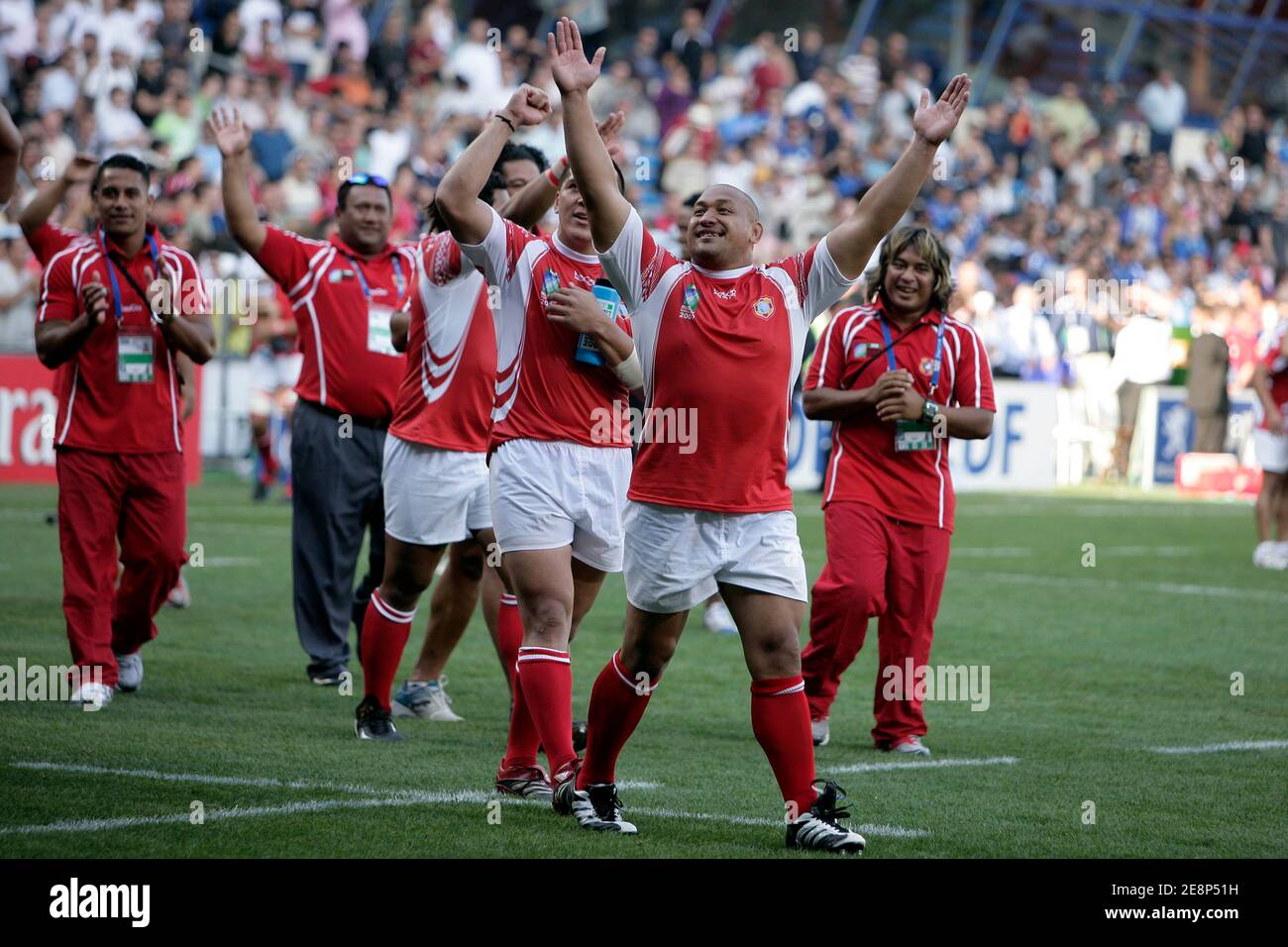 The Tonga team enjoy winning the IRB rugby union World Cup, Pool A ...