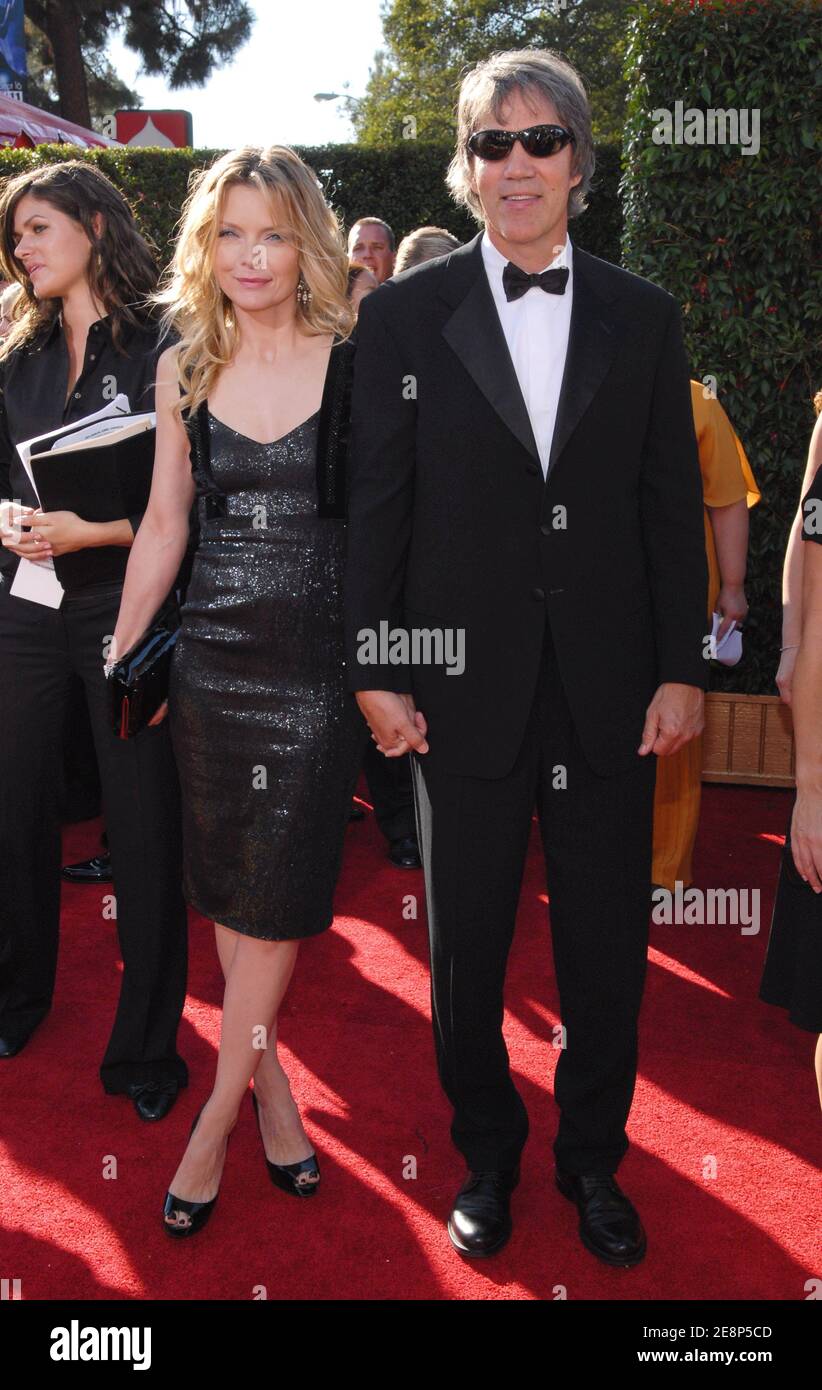 Michelle Pfeiffer and husband David E. Kelley attending the 59th Annual ...