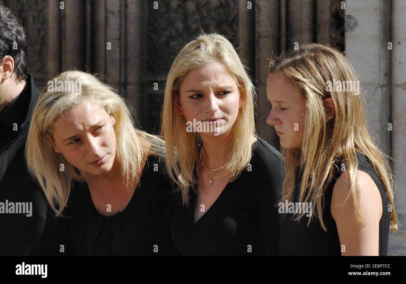 His daughters, Judith, Jeanne-Marie and Juliette wait the arrival of TV ...