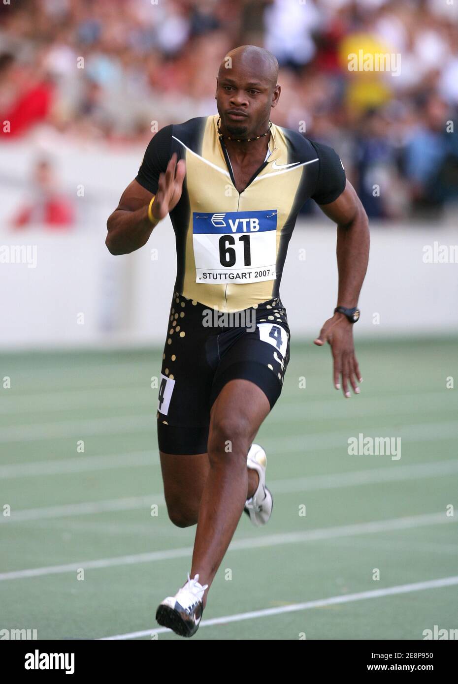 Jamaica's Asafa Powell competes to win in the men's 100m event at the ...