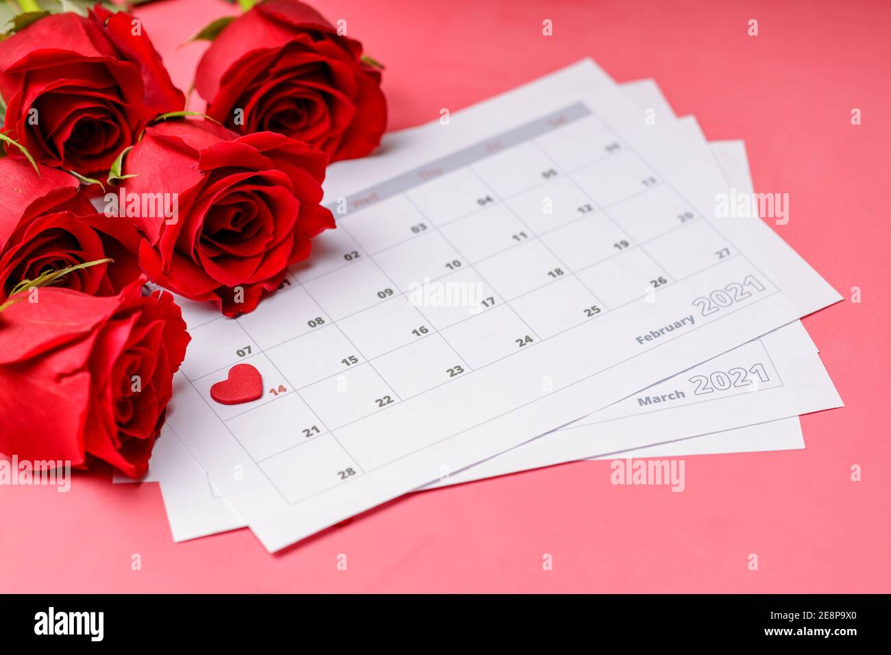 Valentine day. Red hearths and roses on Calendar page. February 14 of ...