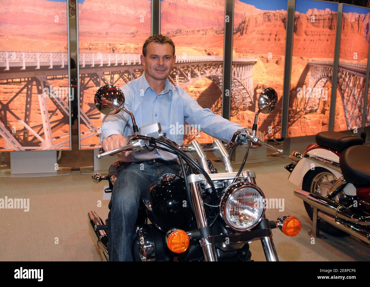 Waterski champion Patrice Martin pose on a custom Honda during the ...
