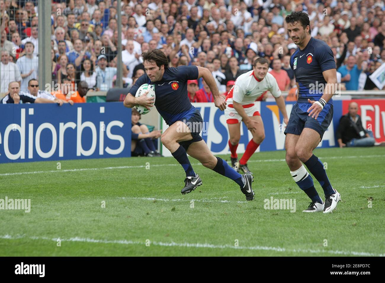 France's Christophe Dominici scores during the IRB Rugby World Cup 2007 ...