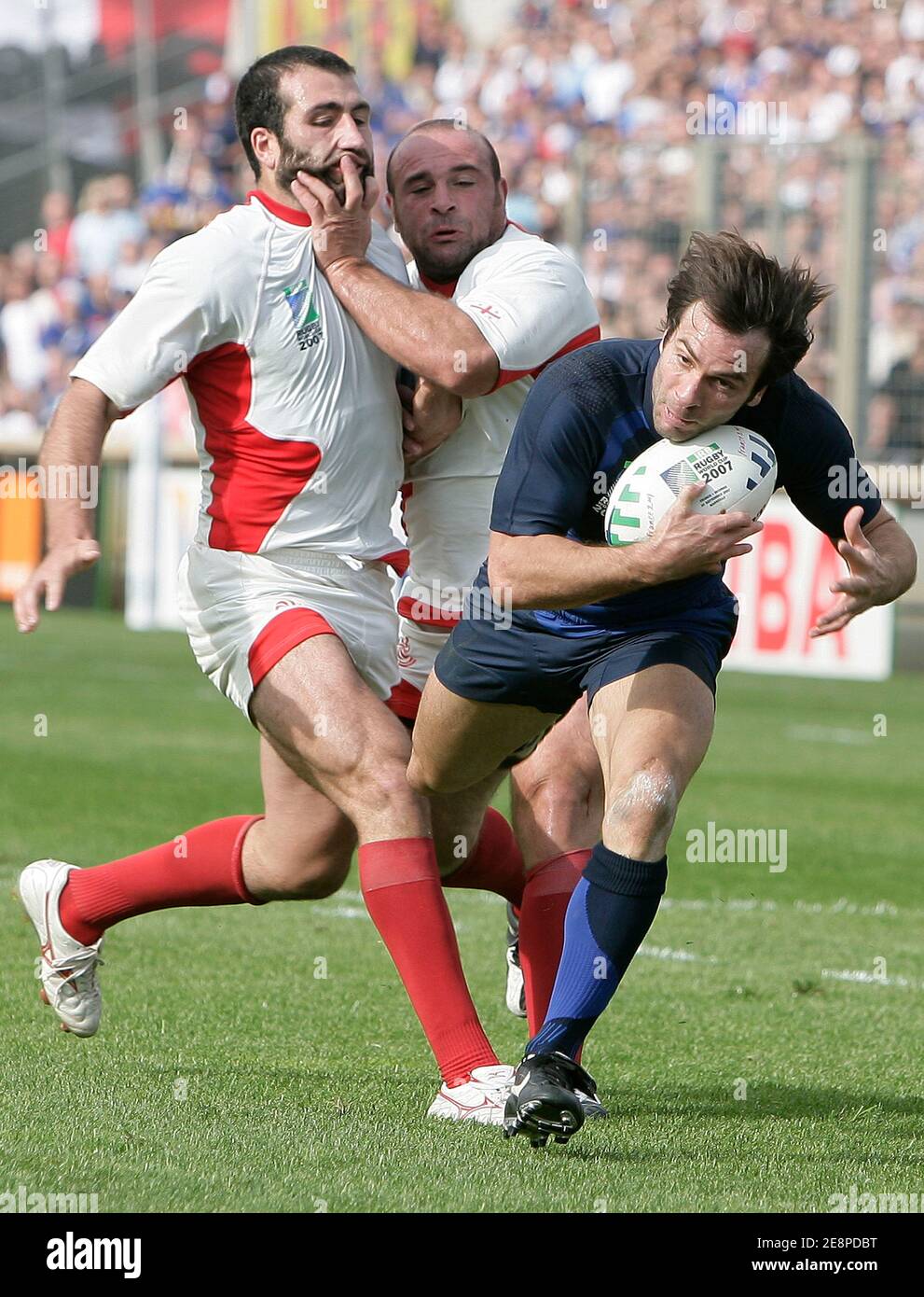 France's Christophe Dominici scores during the IRB Rugby World Cup 2007 ...
