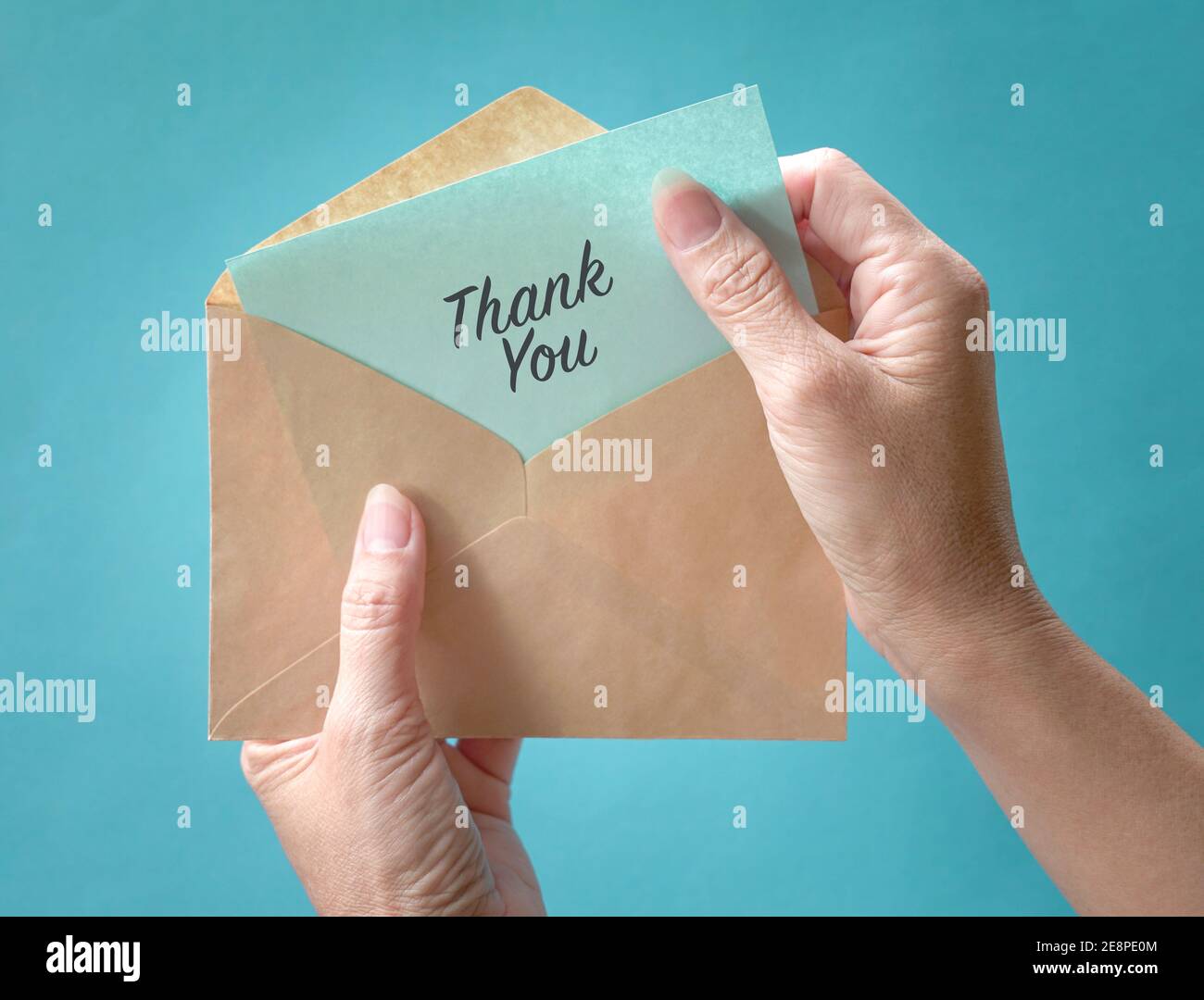 Woman hands holding envelope hi-res stock photography and images - Alamy
