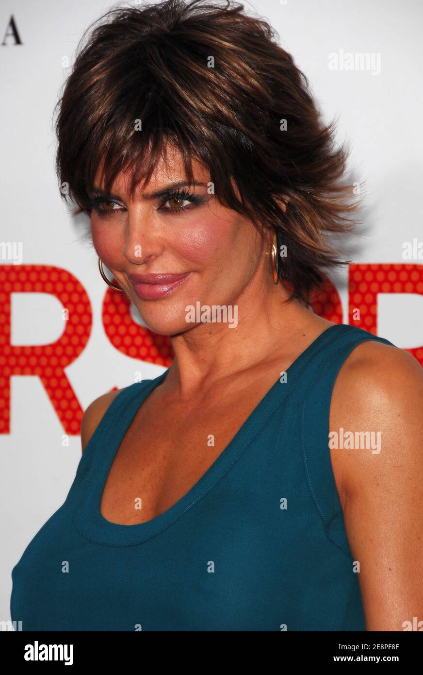 Actress Lisa Rinna attends the premiere of "Hairspray" held at the ...