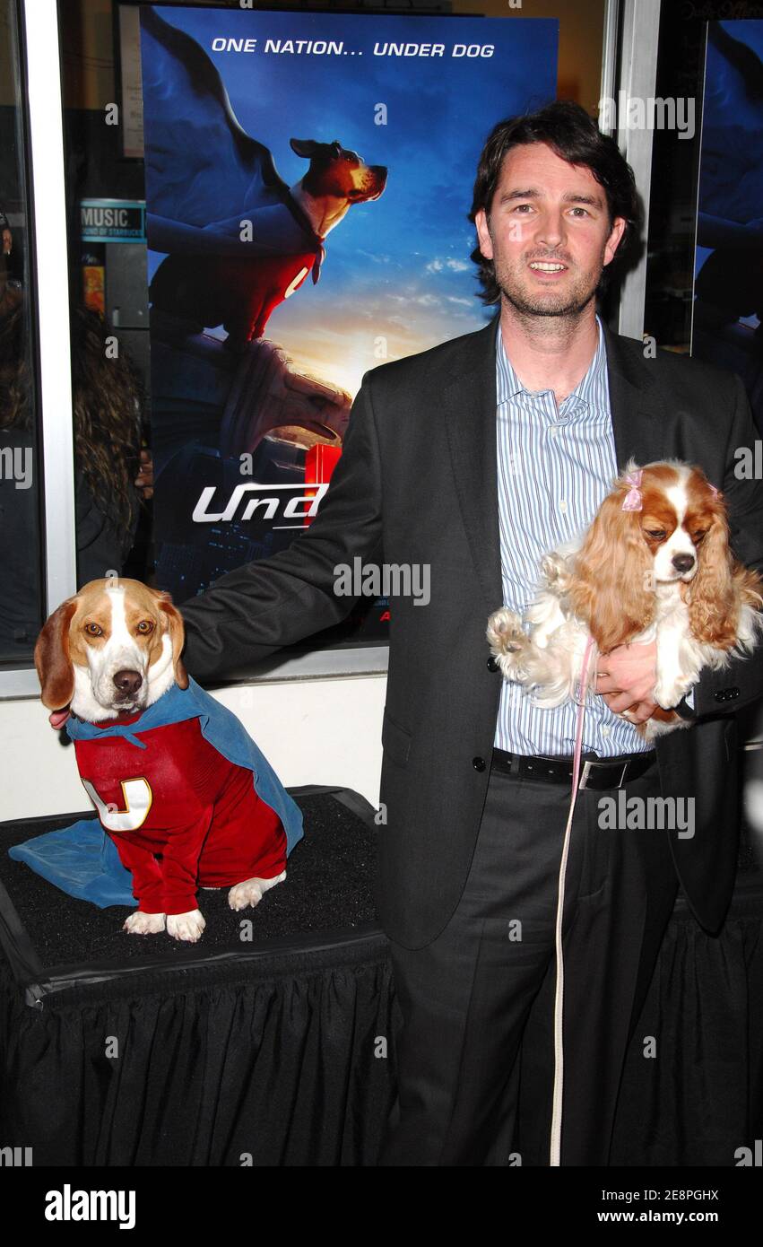 Director Frederik Du Chau poses with Leo (L) the dog who plays Underdog ...